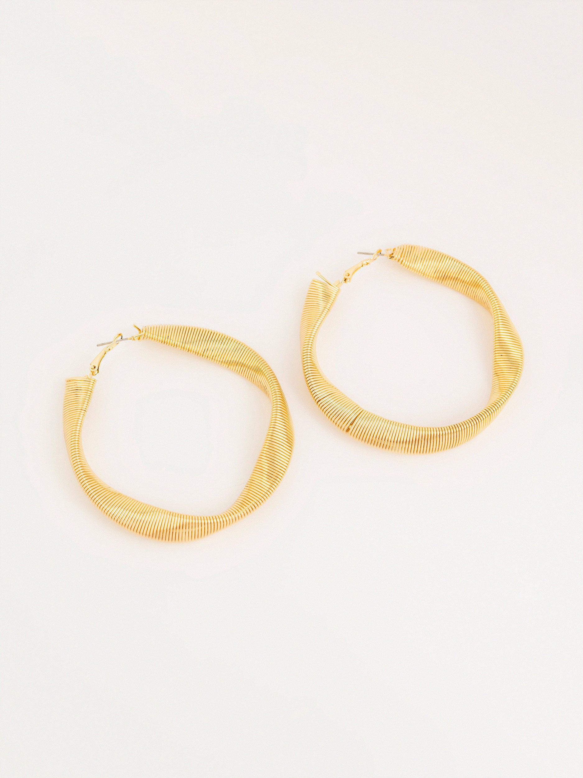 Spiral Hoop Earrings – Limelightpk